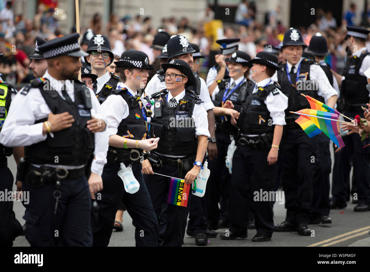 LONDON, UK - July 6th 2019: Police officers take part in the annual gay ...
