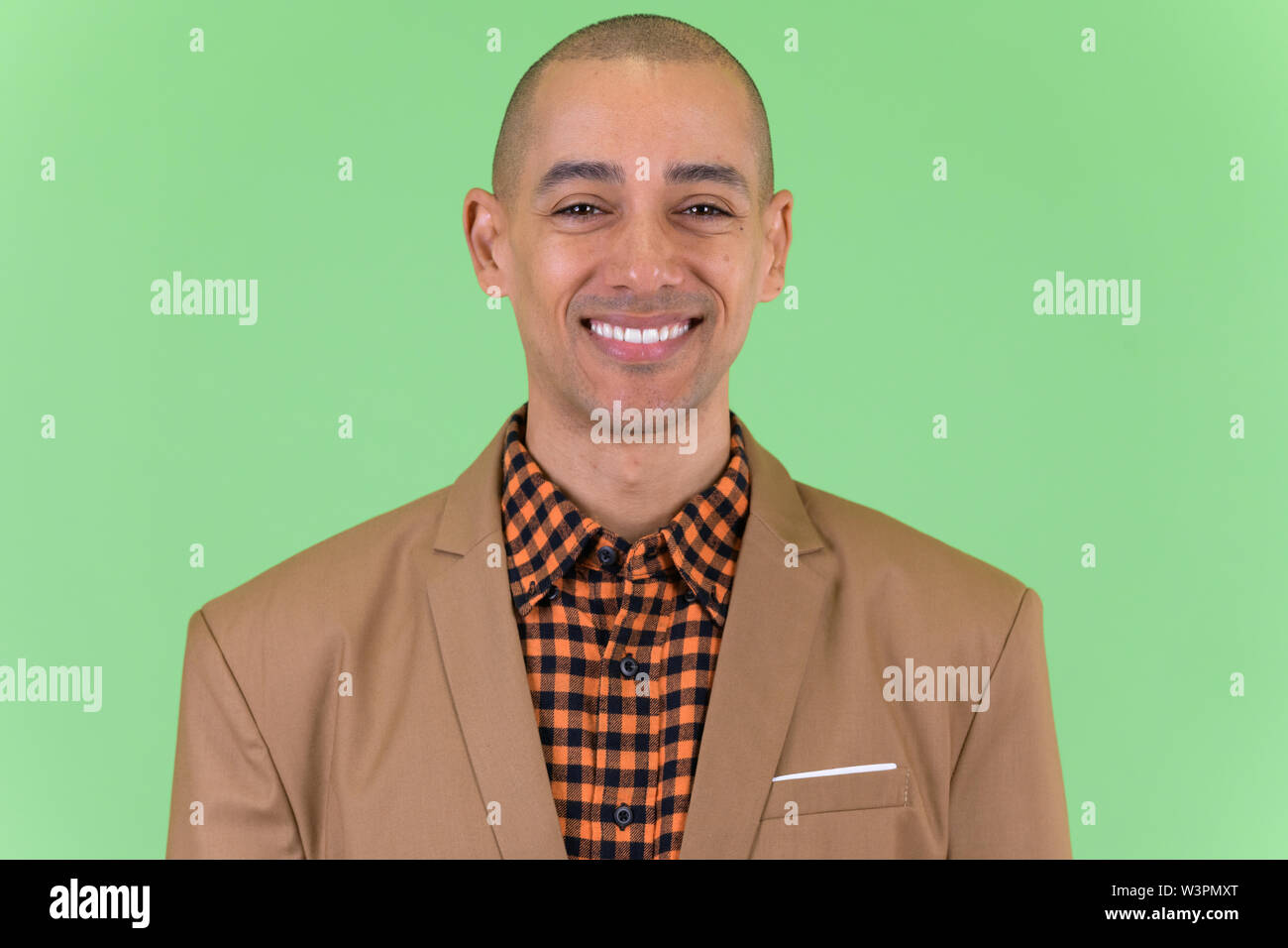 Face of happy bald multi ethnic businessman smiling Stock Photo - Alamy