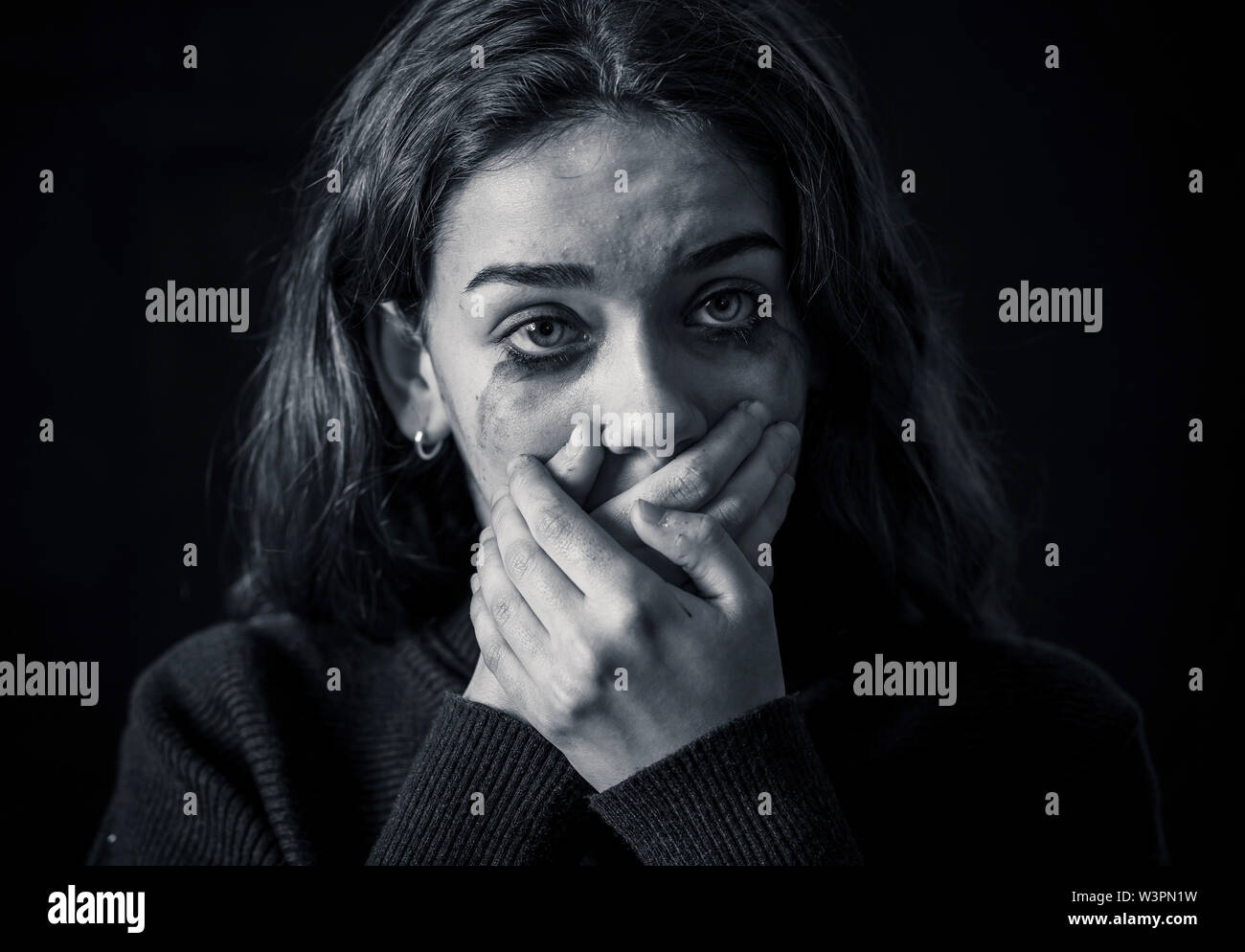 Dramatic closeup portrait of young scared, depressed girl crying alone ...