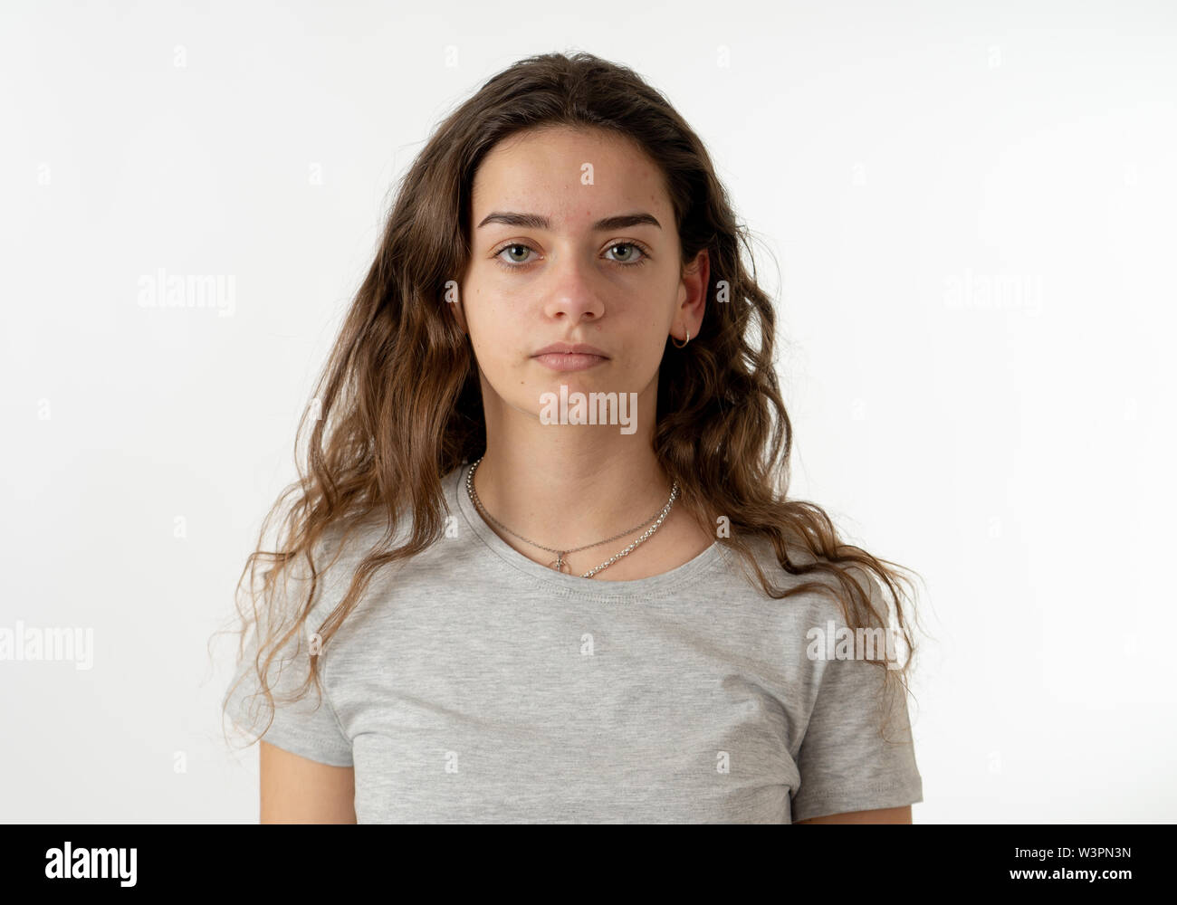 Portrait of beautiful sad miserable young teenager girl with unhappy ...