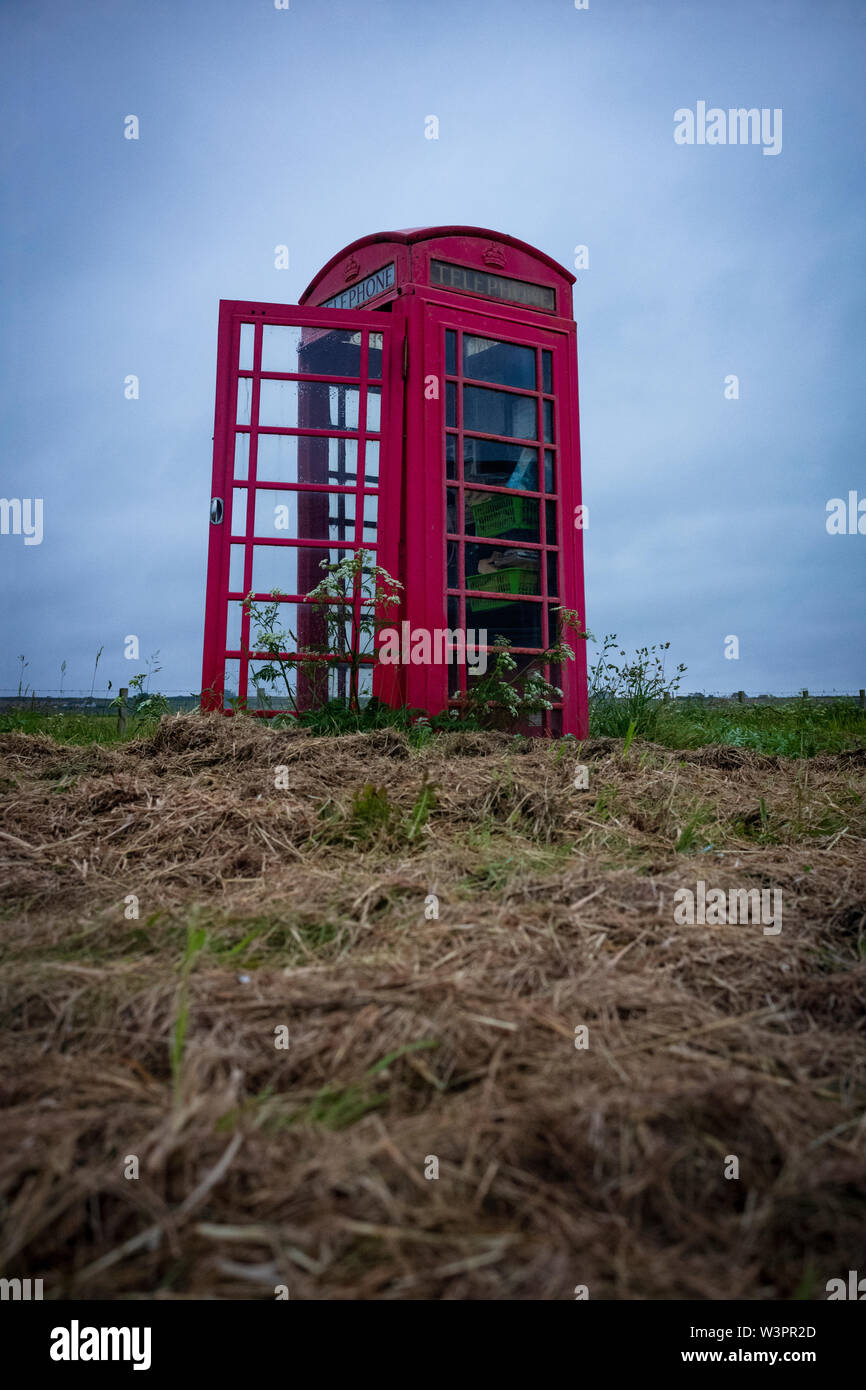 A red telephone box, for a public telephone designed by Sir Giles ...