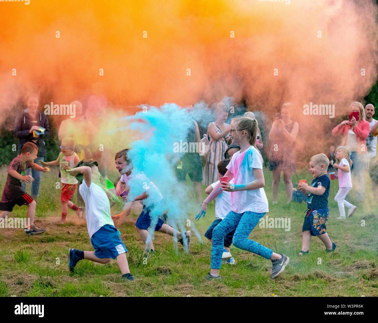 Paint battle with corn flour paint Stock Photo - Alamy
