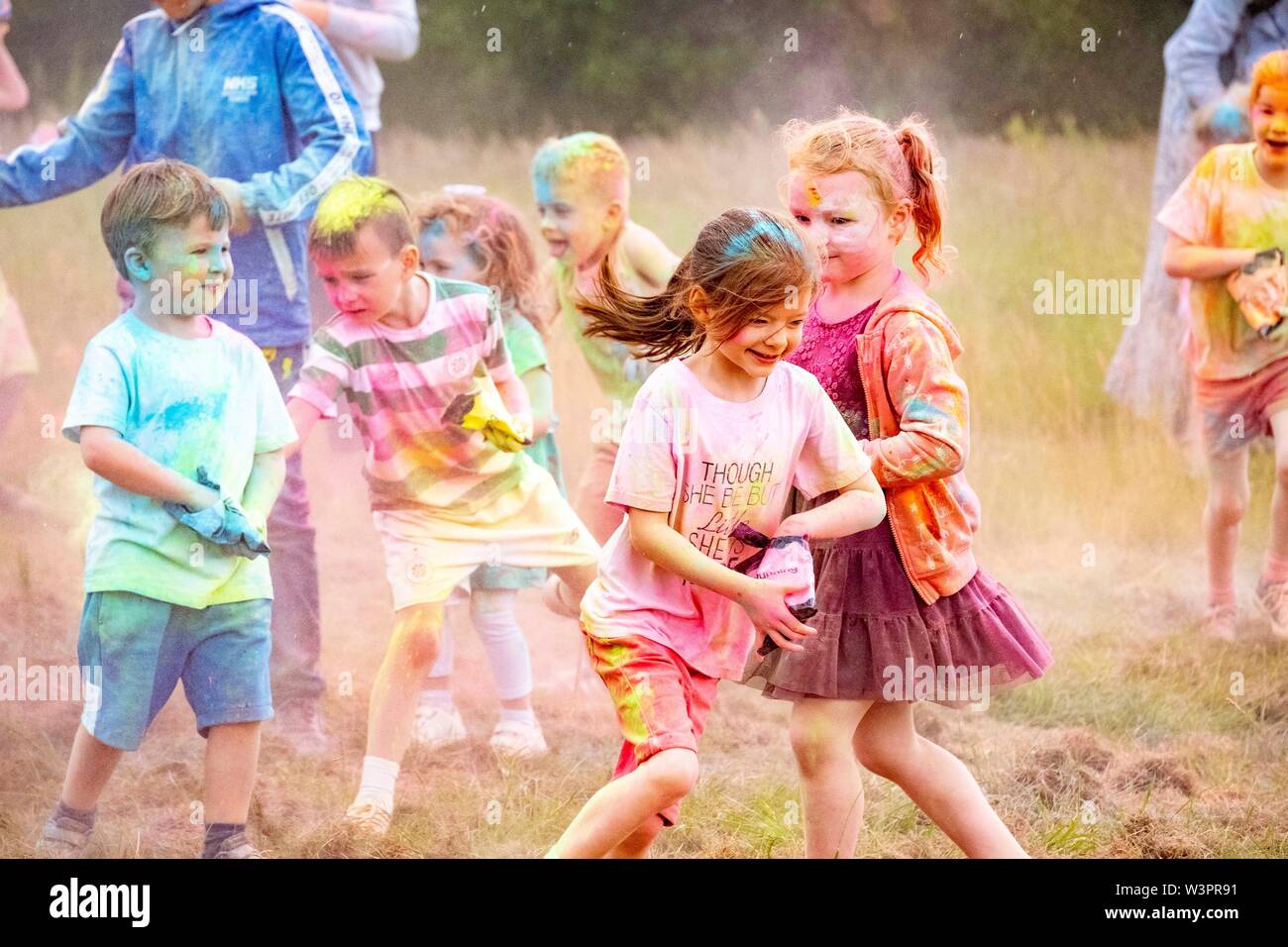 Paint battle with corn flour paint Stock Photo - Alamy