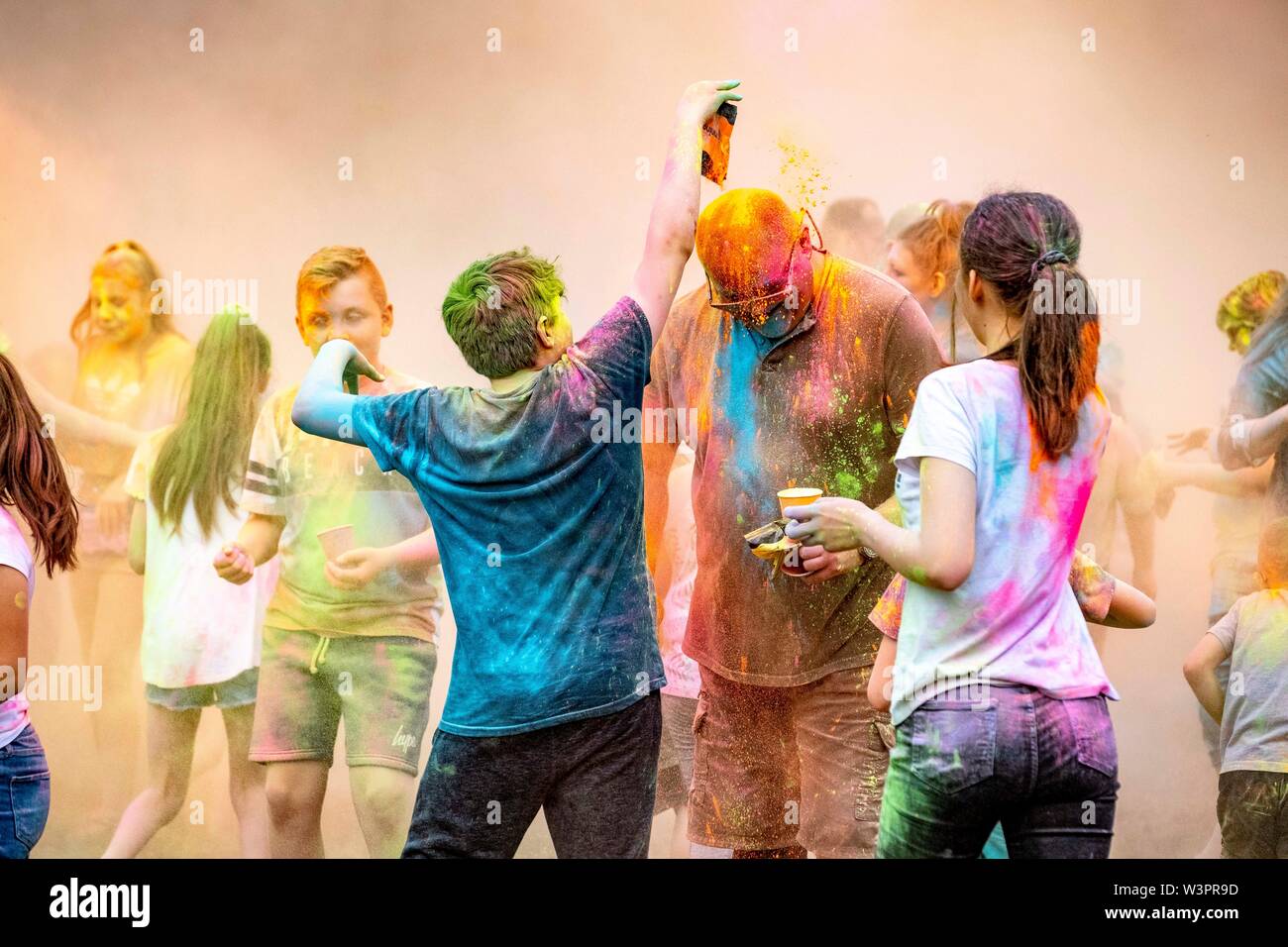 Paint battle with corn flour paint Stock Photo - Alamy