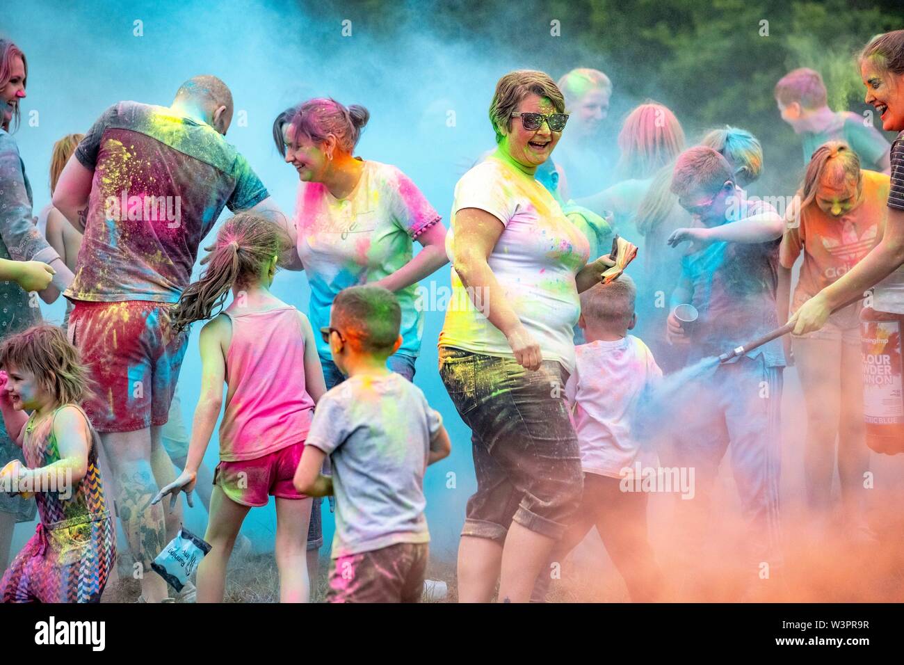 Paint battle with corn flour paint Stock Photo - Alamy
