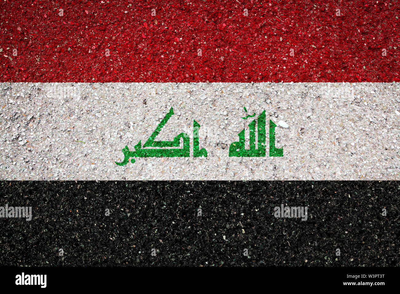 National flag of Iraq on a stone background.The concept of national ...