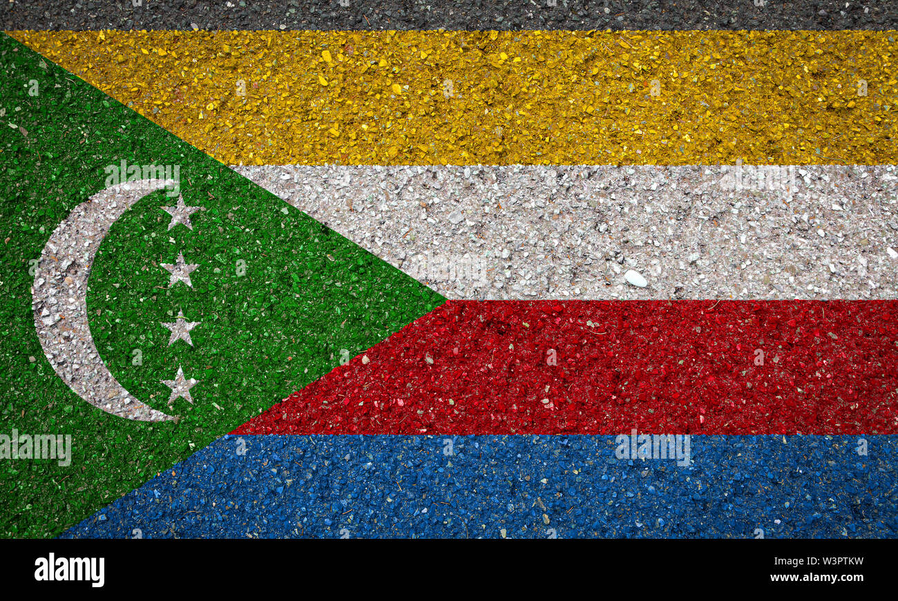 National flag of Comoros on a stone background.The concept of national ...