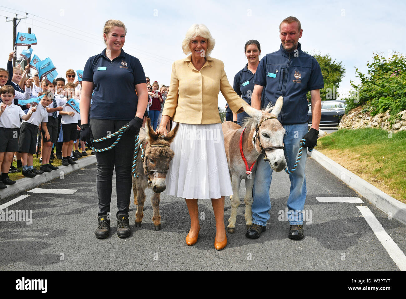 The Duchess of Cornwall with donkeys William (right) and Harry during ...