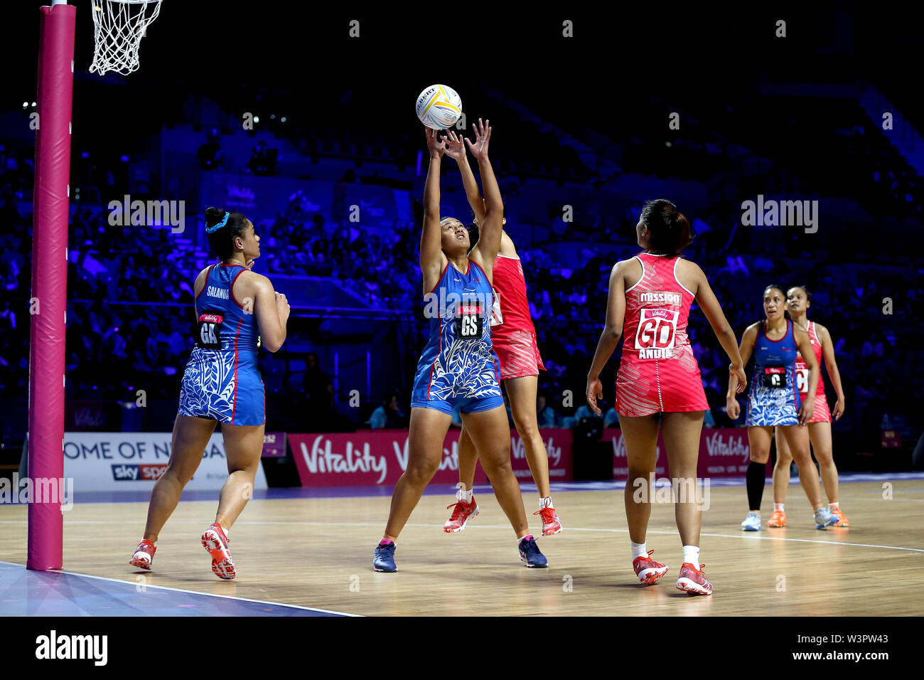 Samoa's Toa Tanimo (centre) in action against Singapore during the ...