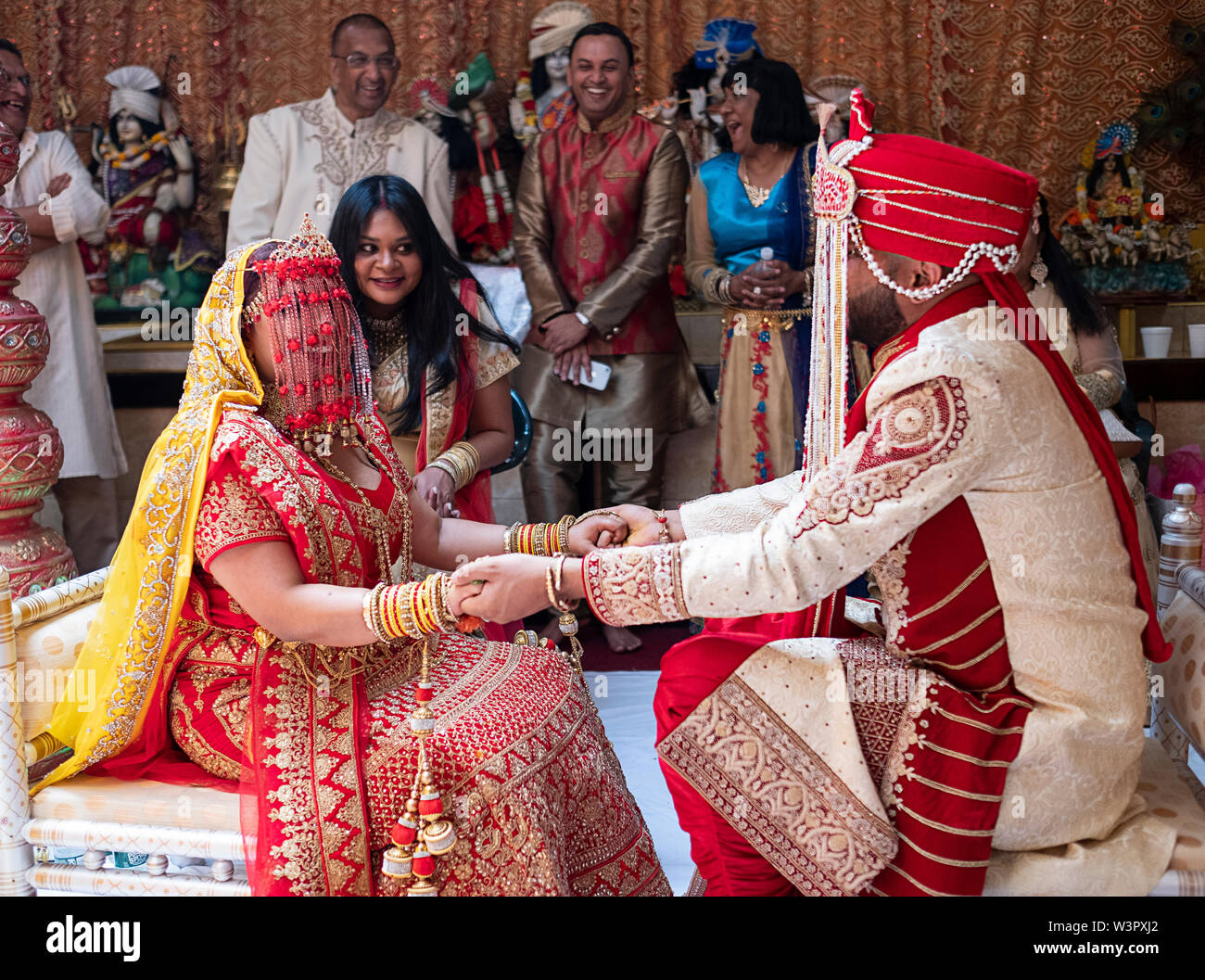 Bride and groom holding hands hi-res stock photography and images - Alamy