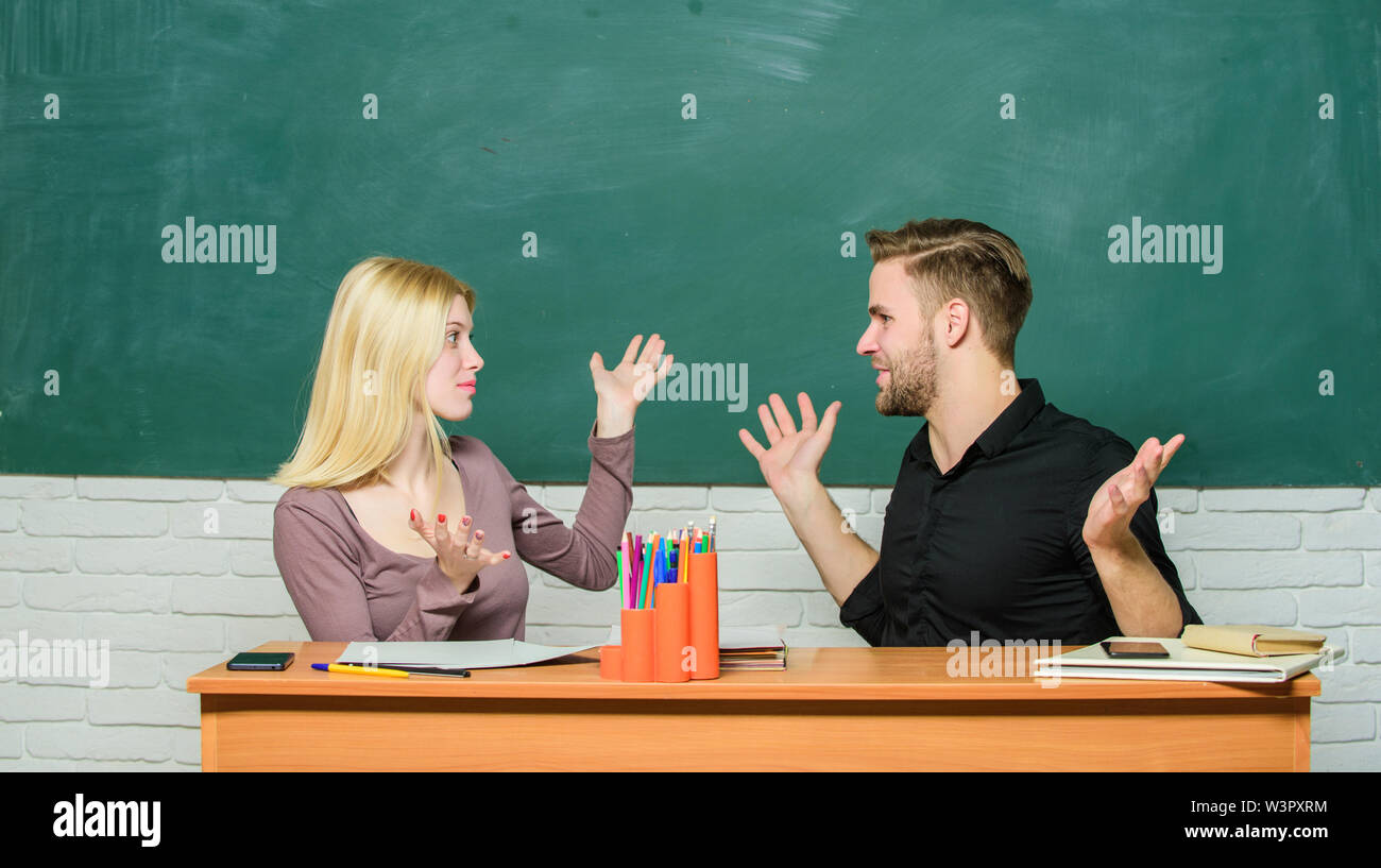 Students communicate classroom chalkboard background. Education concept ...