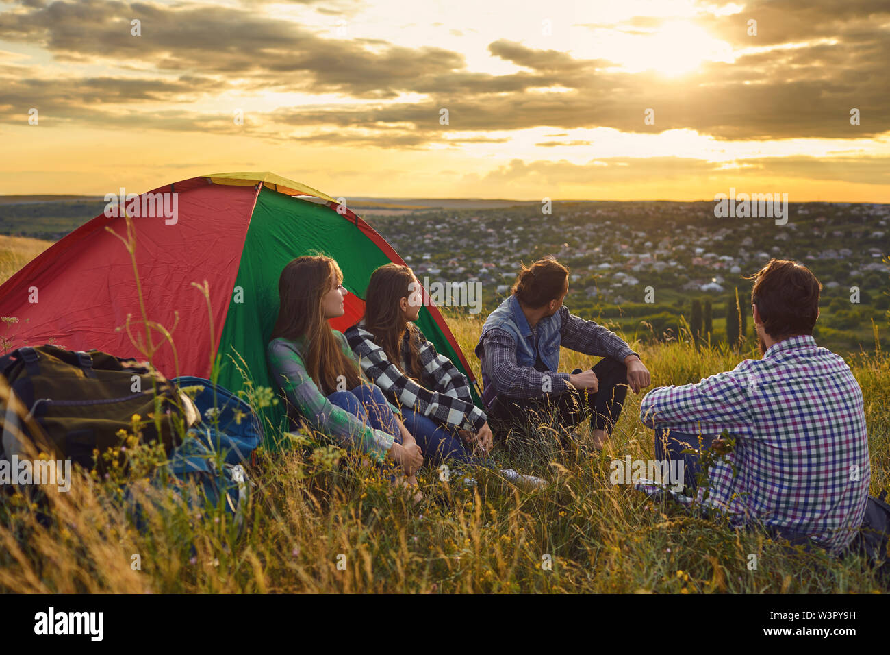 Camping tent camp people tourists sitting the sunset in nature Stock ...