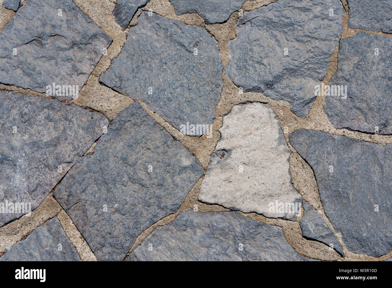 The stone texture of the wall or track. Beautiful stone texture, design ...