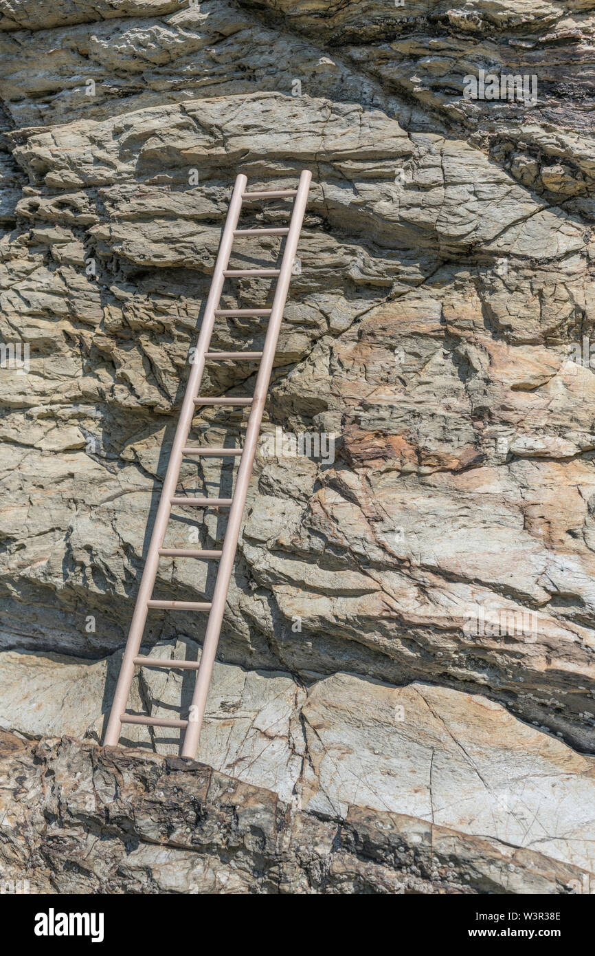 Small wood toy ladder propped against cliff face. Metaphor climbing ...
