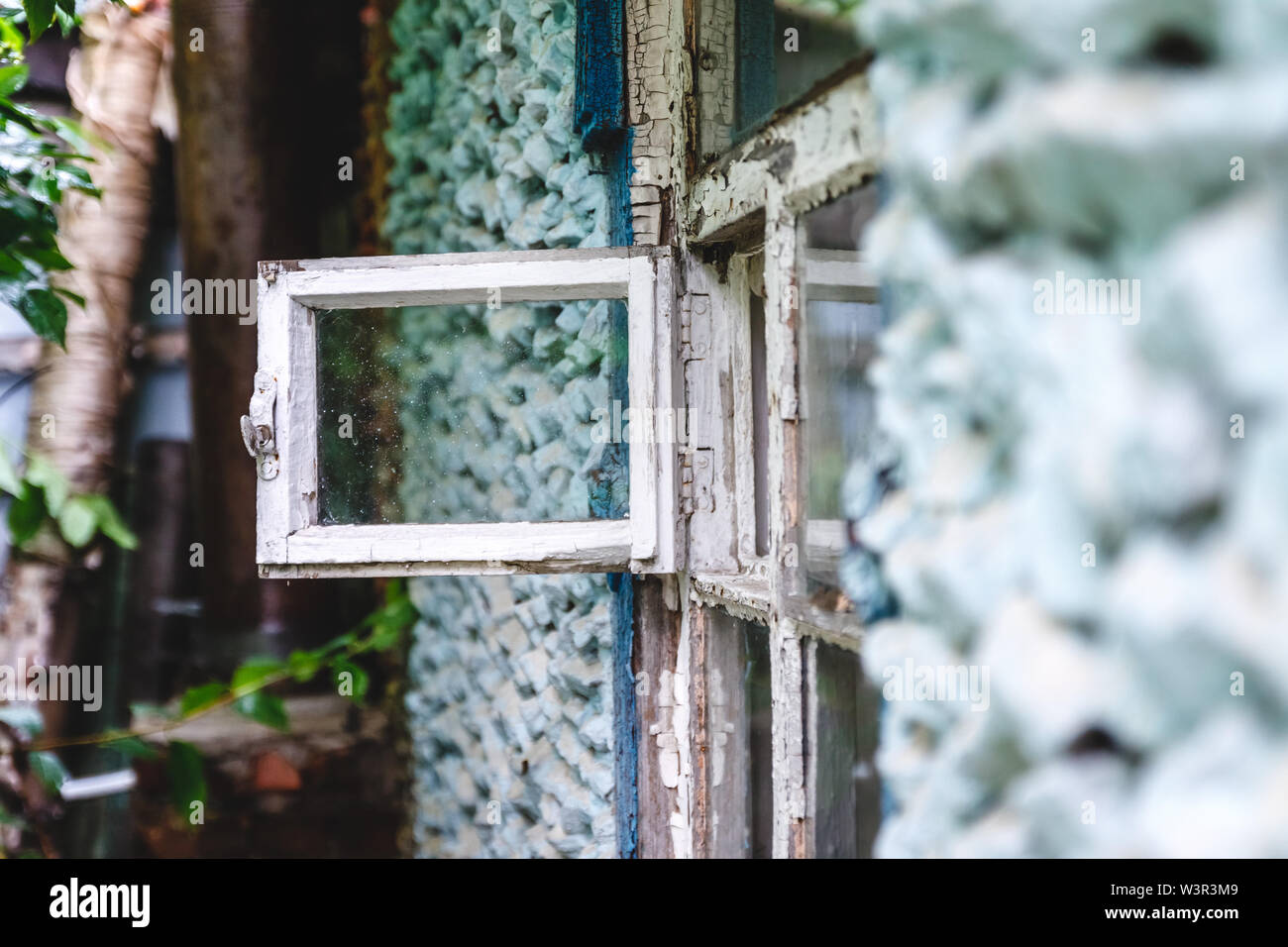 In the old village house opened a small window Stock Photo - Alamy