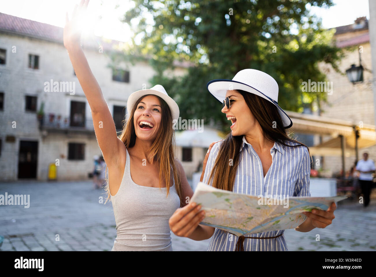 Girl friends travelling summer vacation exploring to discover carefree ...