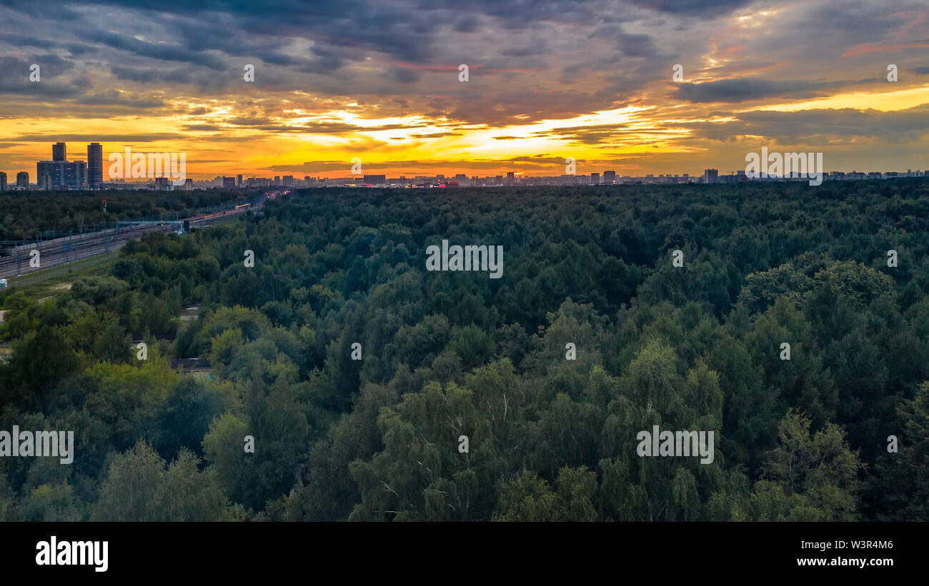 Drone flying over city park hi-res stock photography and images - Alamy