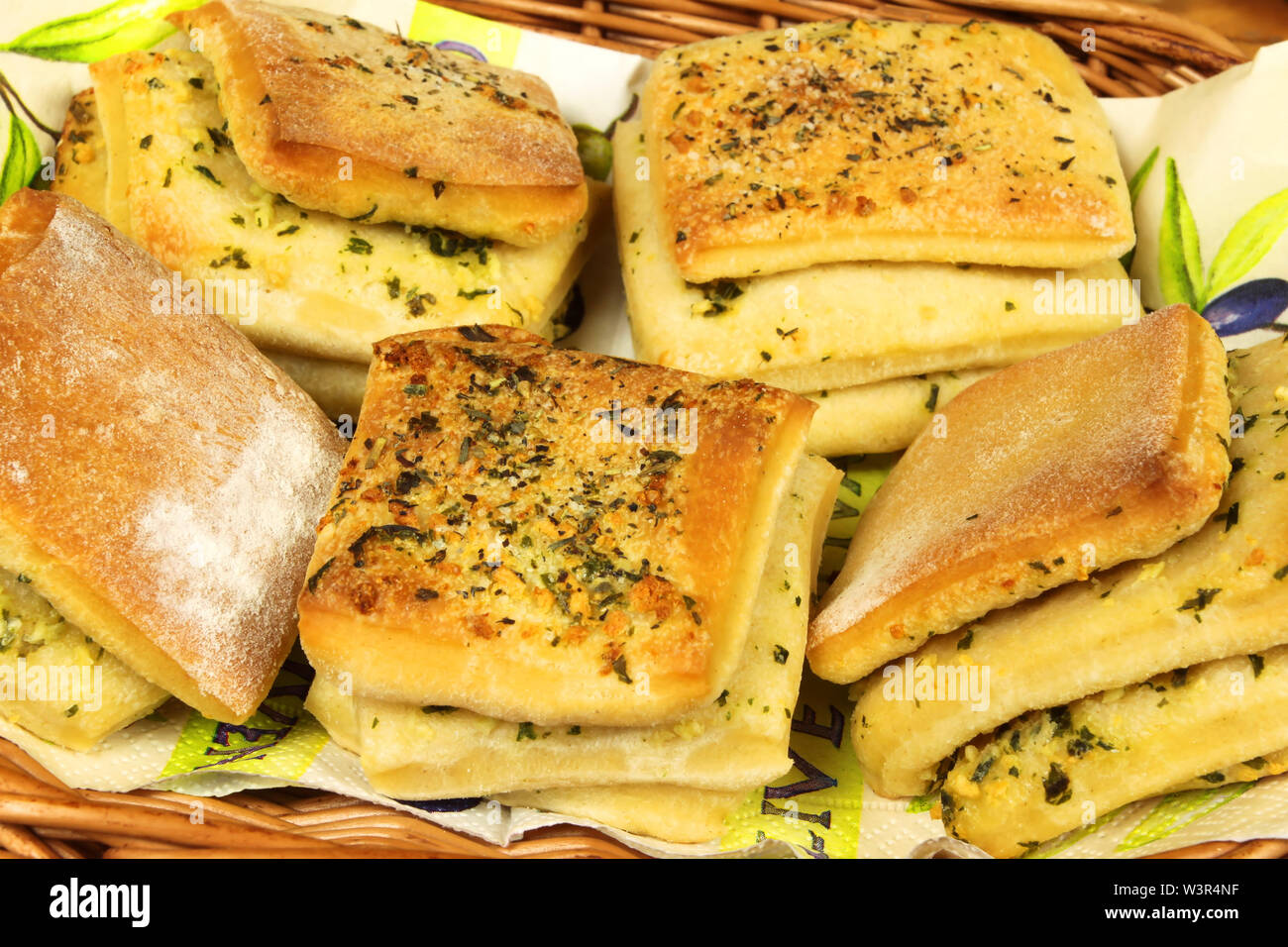 Close up of home-made layered bread rolls filled with garlic, butter ...