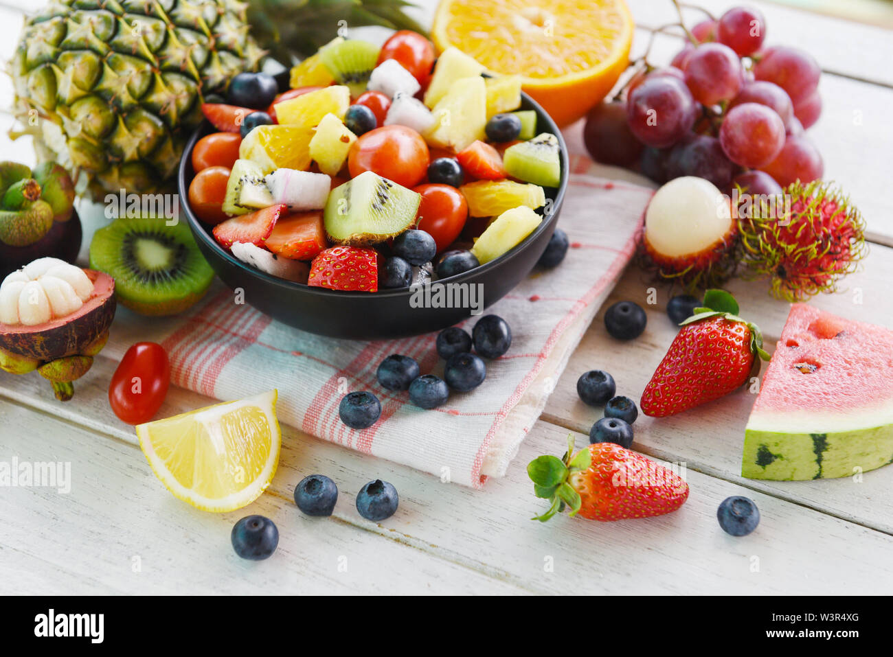 Fruit salad bowl fresh summer fruits and vegetables healthy organic ...