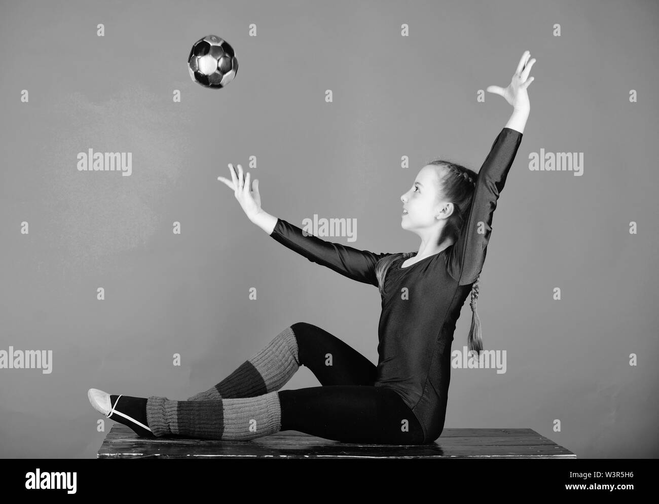 Flexible healthy body. Practicing gymnastics hard before performance ...