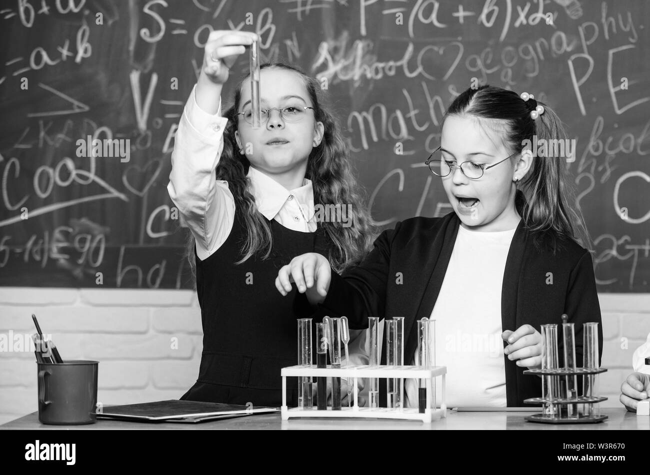 Little children. Science. Chemistry science. biology experiments with ...