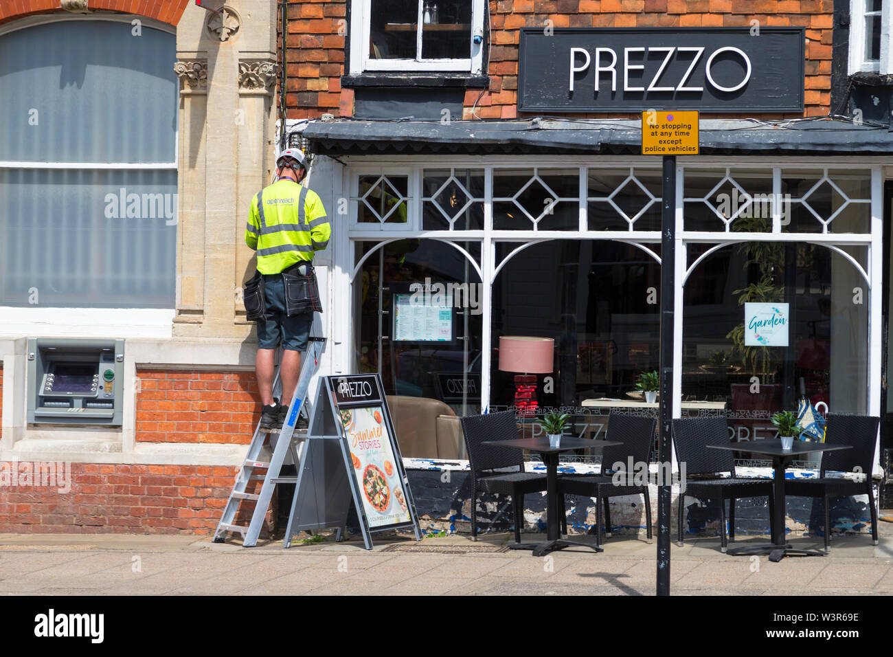 Openreach telecoms engineer working at height, tenterden, kent, uk ...