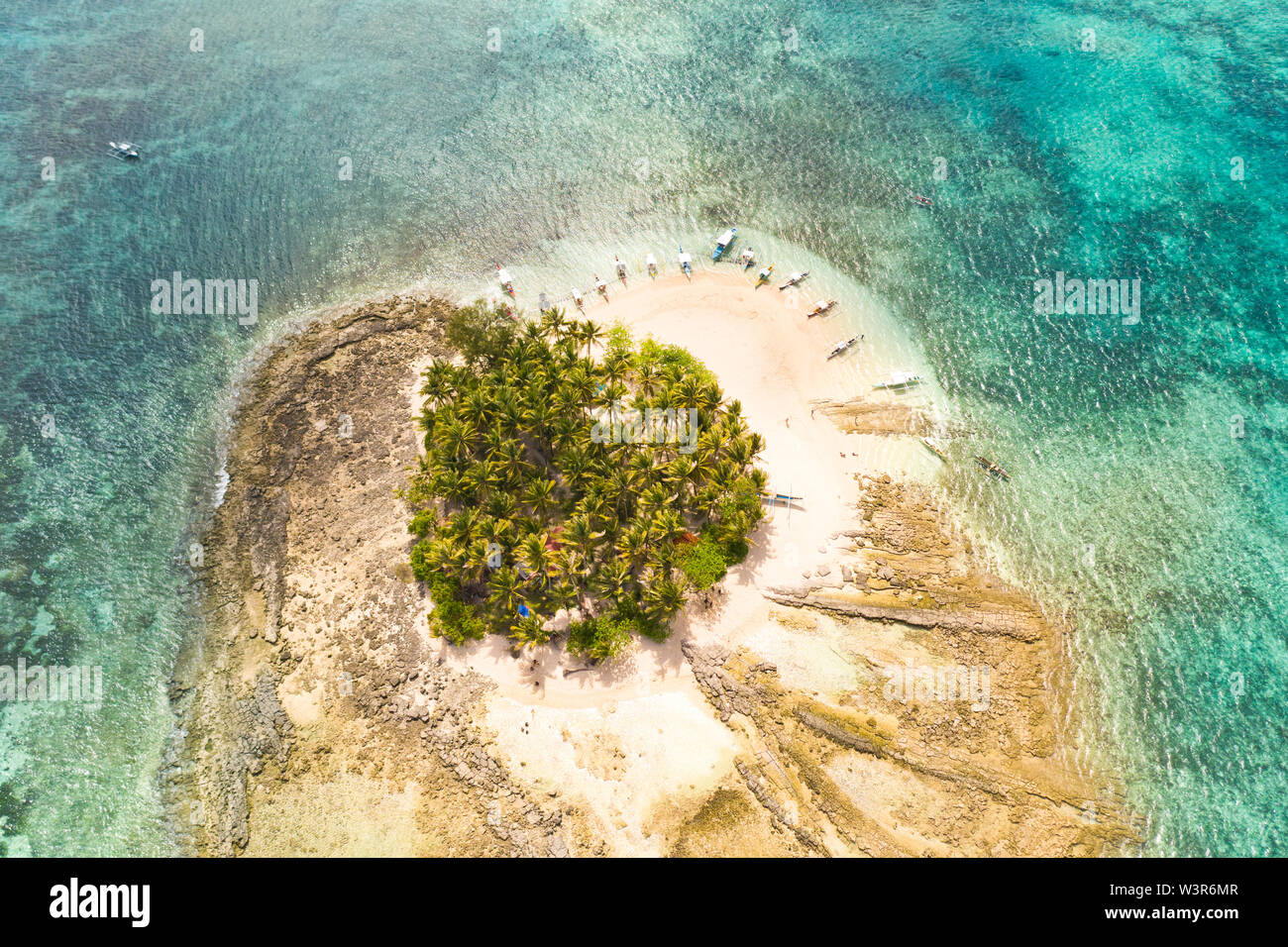 Guyam island, Siargao, Philippines. Small island with palm trees and a ...