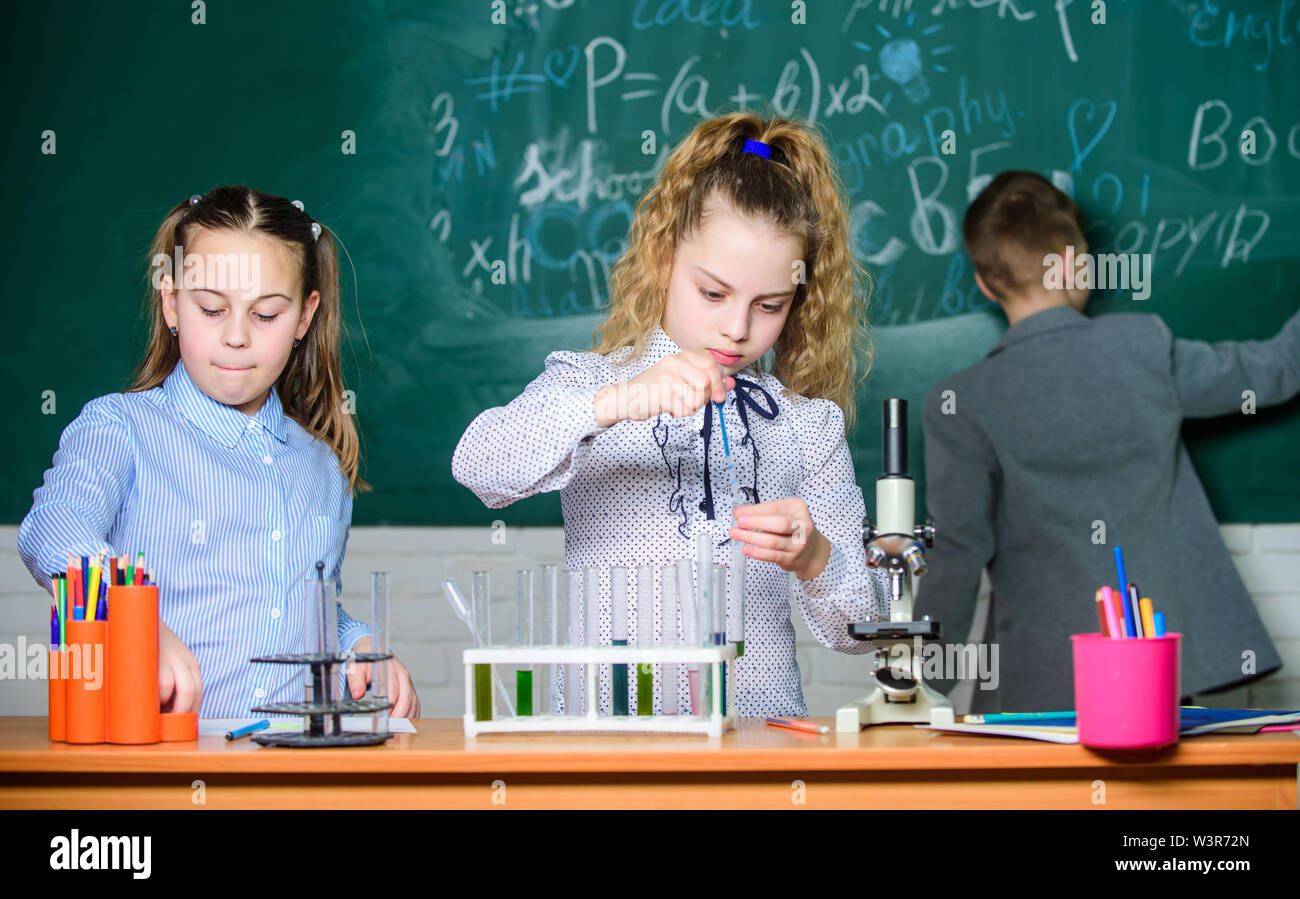 School girls study. Explore biological molecules. Future technology and ...