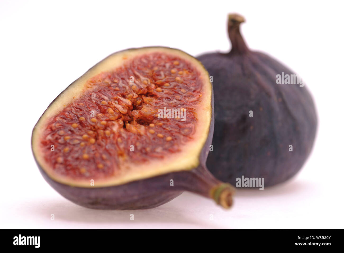 sweet fig fruit isolated over white background Stock Photo - Alamy