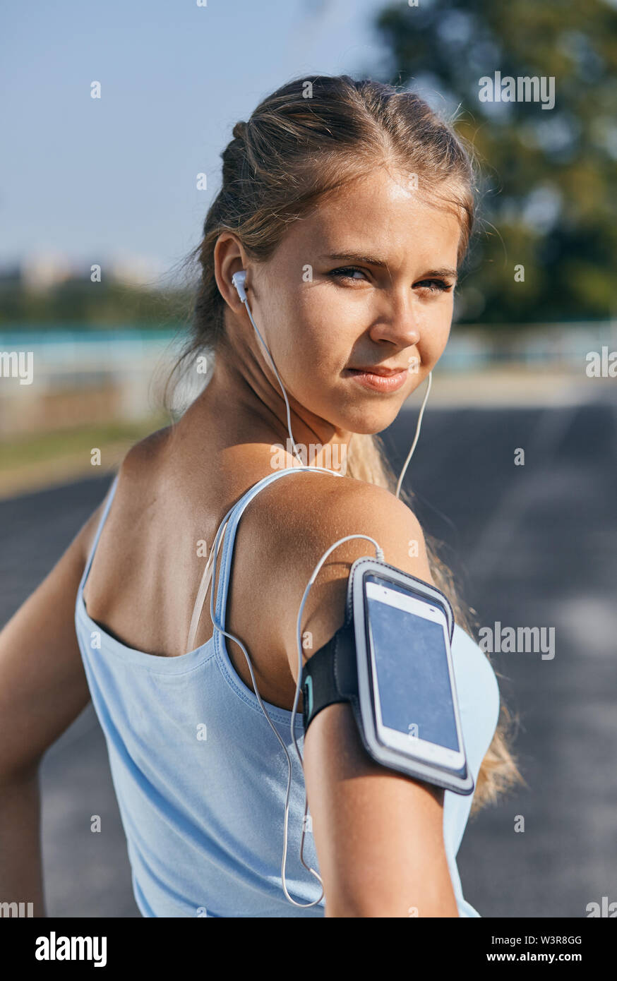 Happy blonde runner hi-res stock photography and images - Alamy