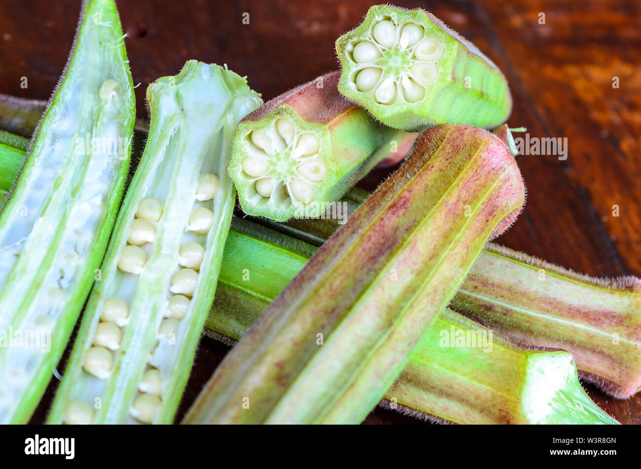 Organic agriculture. Cross-section ripe fruit of okra Stock Photo - Alamy