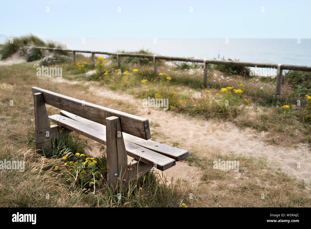 Wooden Bench on a clifftop in Southbourne Bournemouth Stock Photo - Alamy