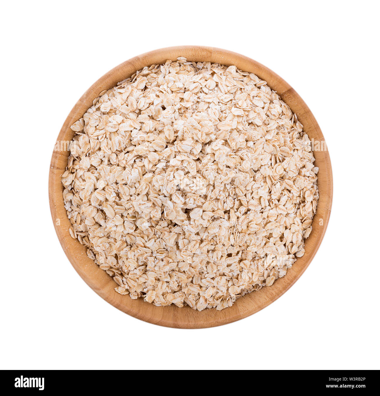 Oat flakes pile in bowl on white background Stock Photo - Alamy