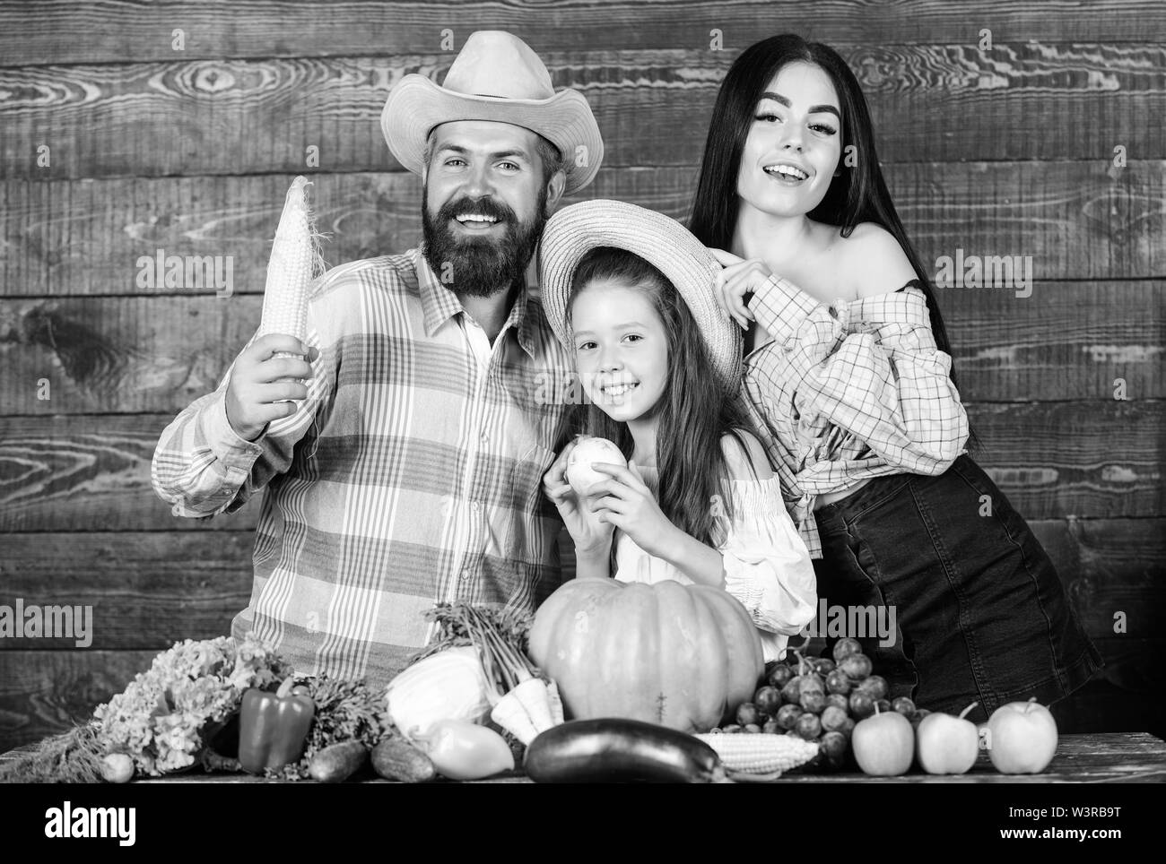Family farm festival concept. Man bearded rustic farmer with kid and ...