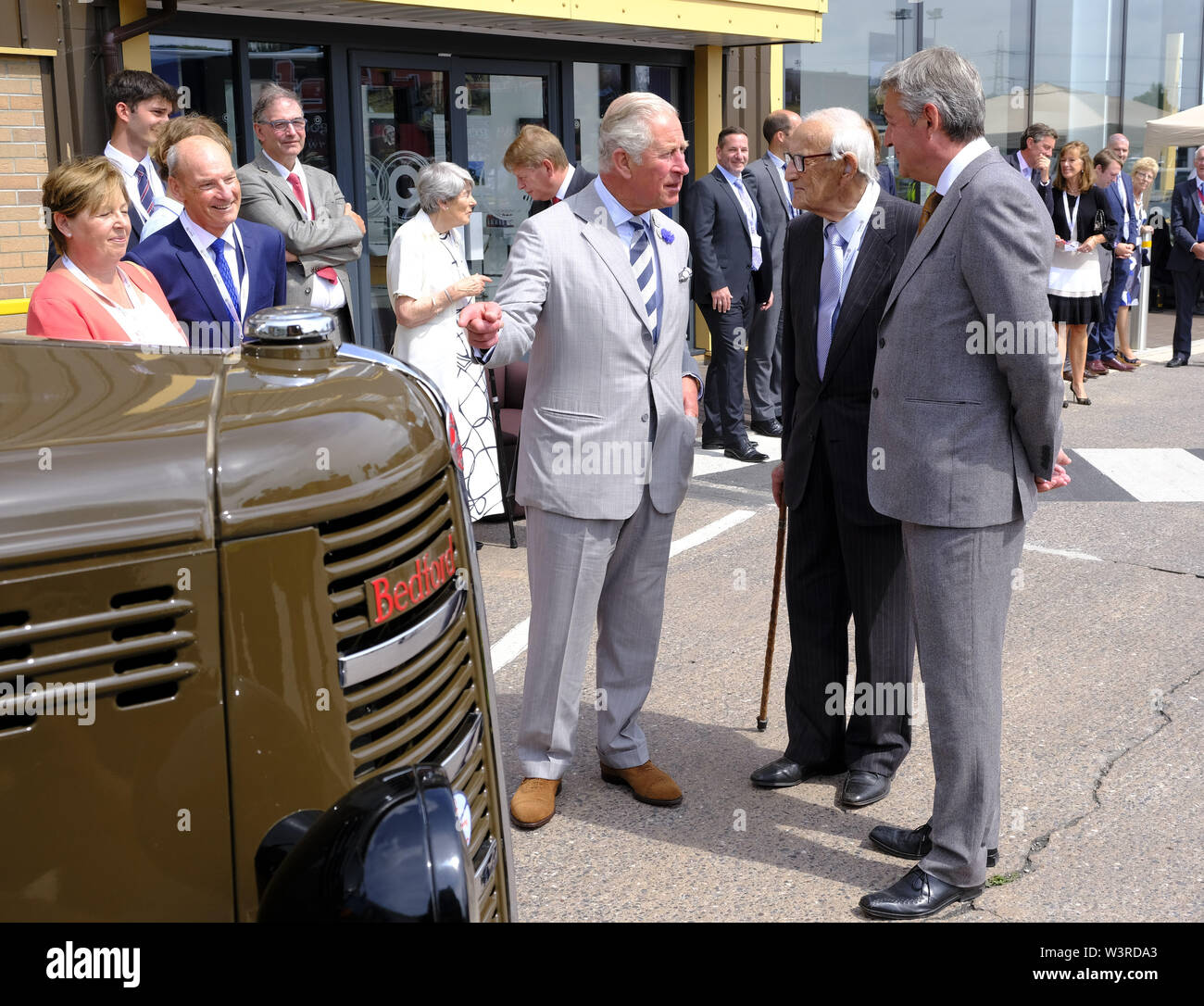 The Prince of Wales (centre) during his to the visit the headquarters ...