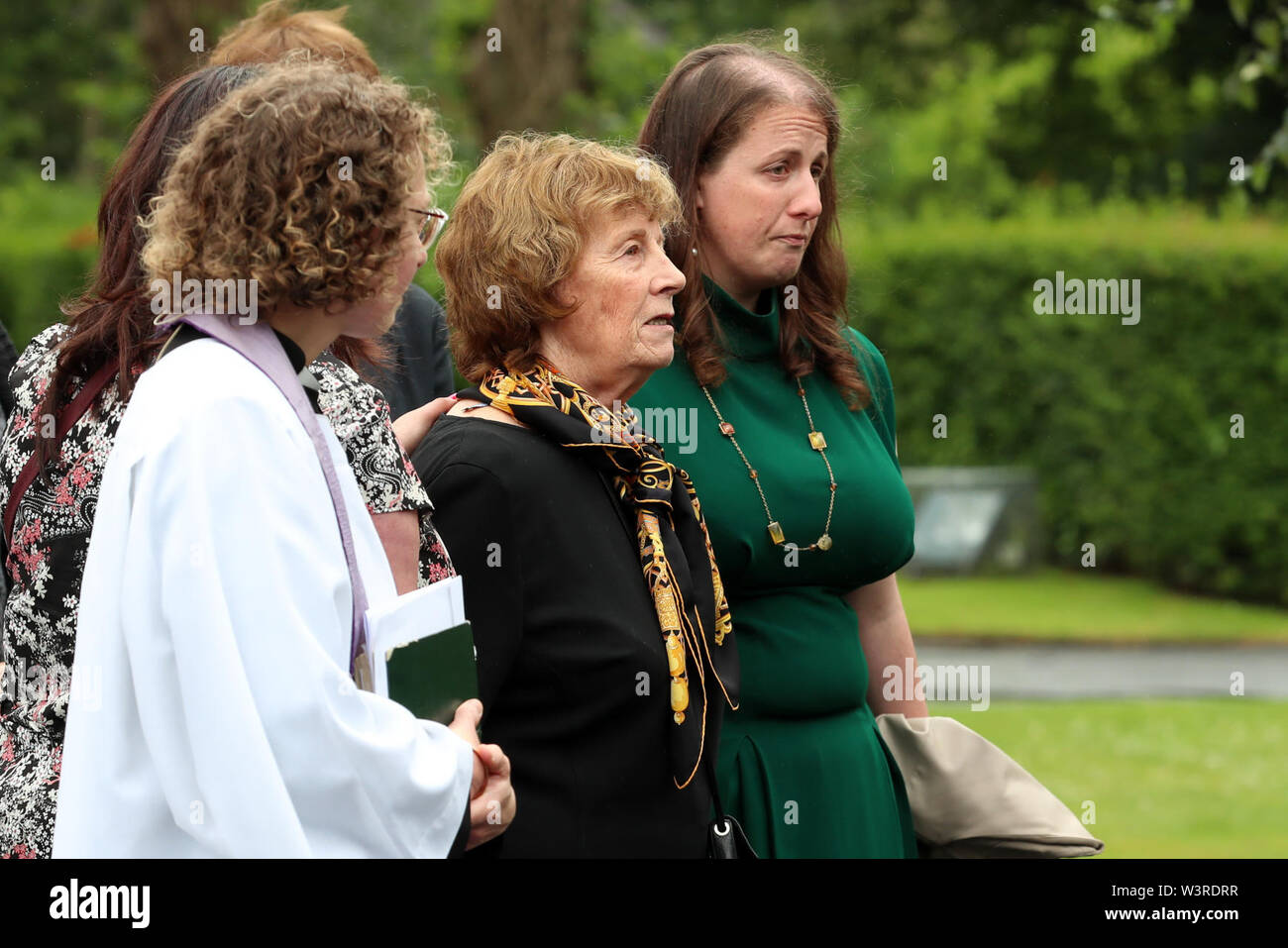 The coffin of Sir Anthony Hart is carried from St Mark's Church of ...
