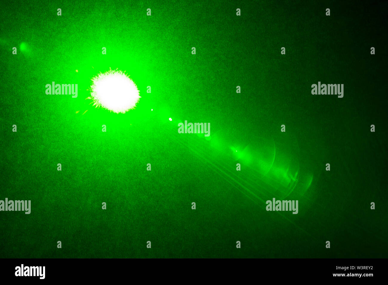 Camera lens flare by laser light create circles of objective iris ...