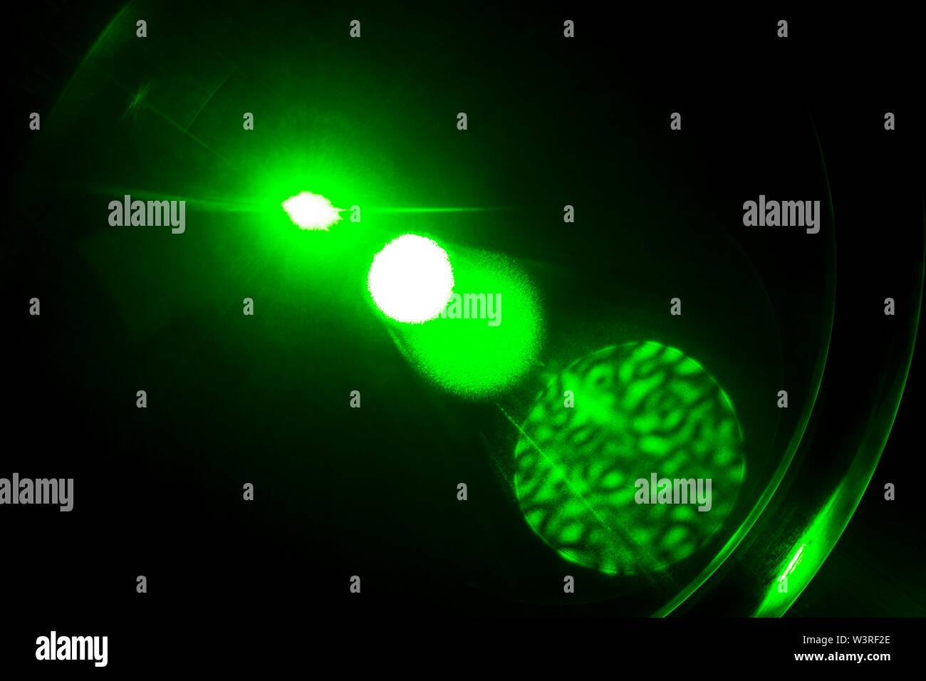 Camera lens flare by laser light create circles of objective iris ...