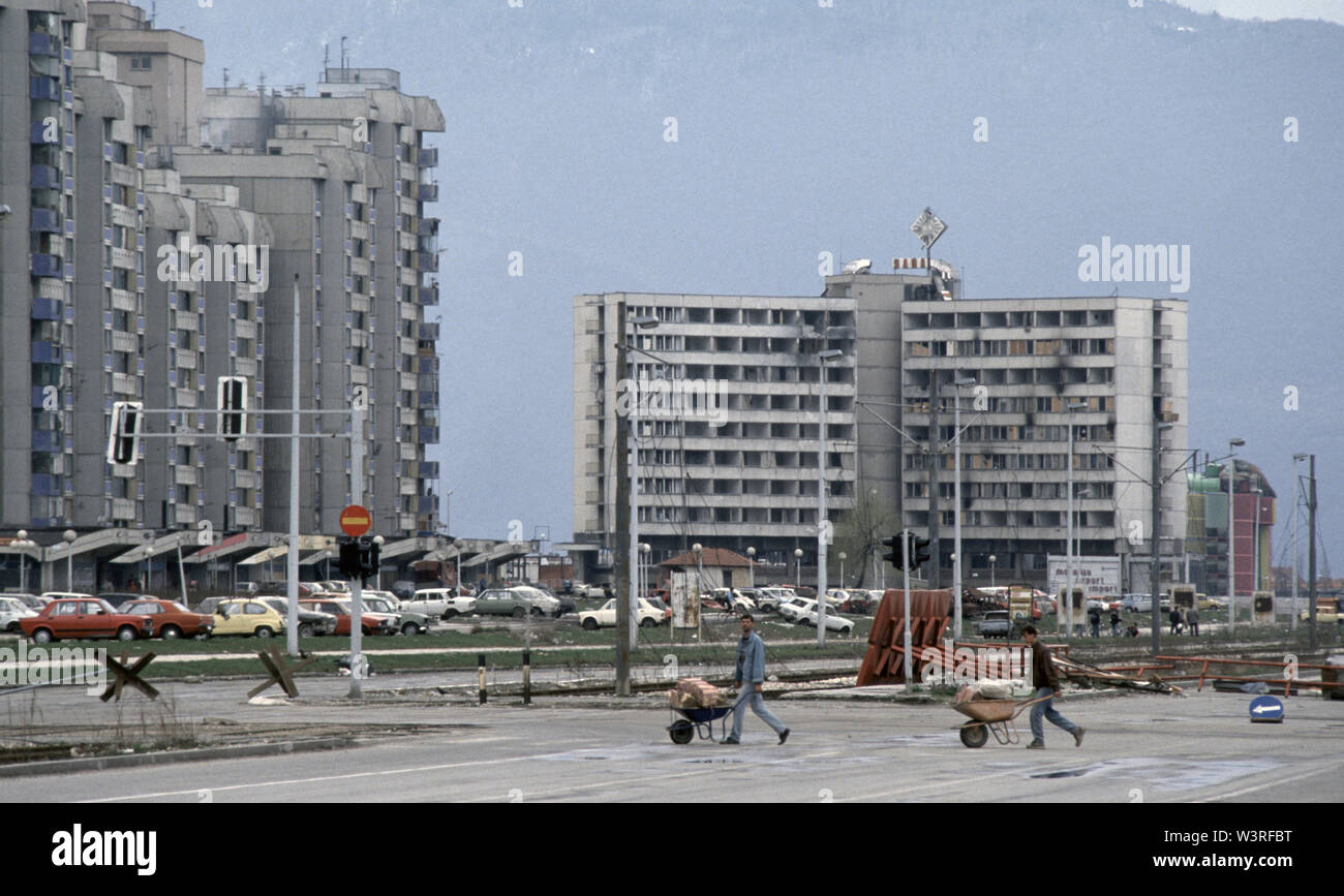 11th April 1993 During the Siege of Sarajevo: two young men push wheel ...
