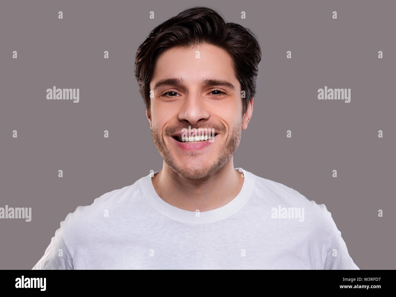 Man attractive happiness smiling look hi-res stock photography and ...
