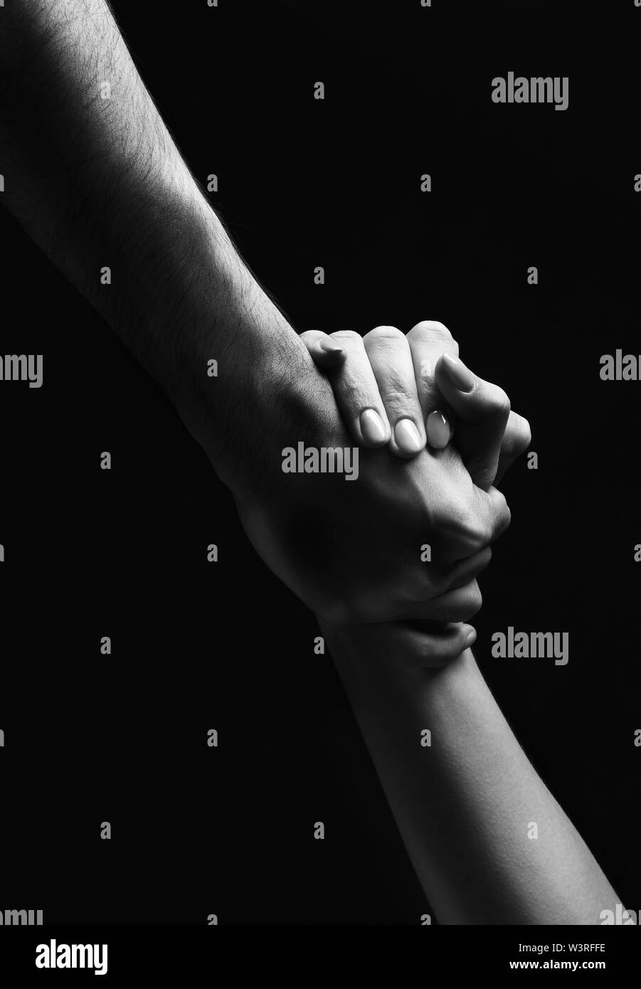 Lend a hand in hour of need Stock Photo - Alamy