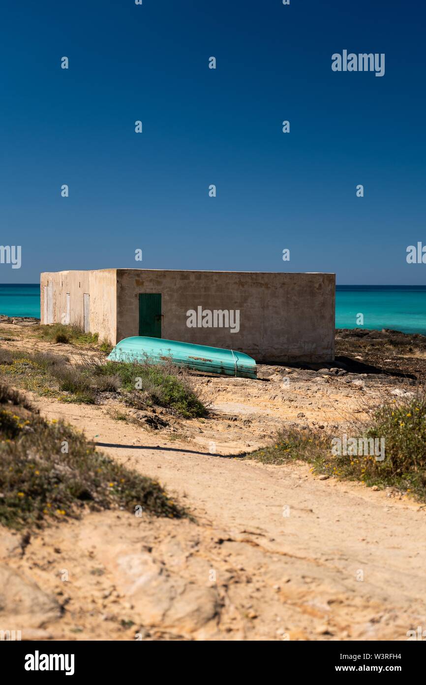 Small stone structure near the coast of the sea with a beautiful blue ...