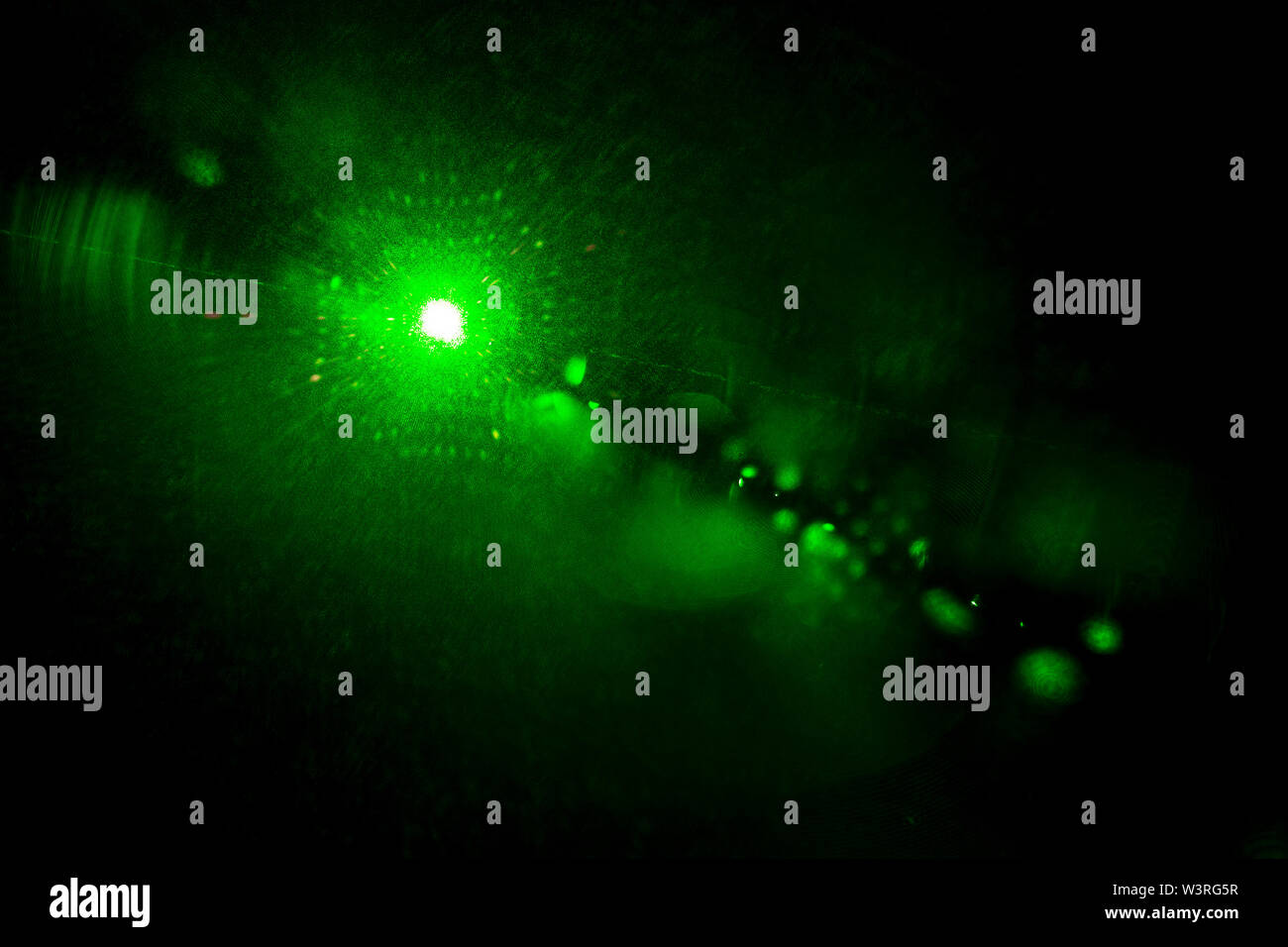 Camera lens flare by laser light create circles of objective iris ...