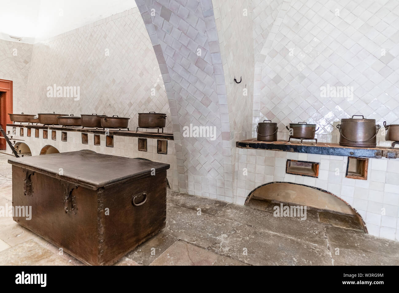 Old kitchen interior full of copper pots, National Palace of Sintra ...