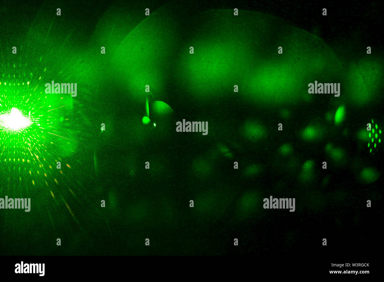 Camera lens flare by laser light create circles of objective iris ...