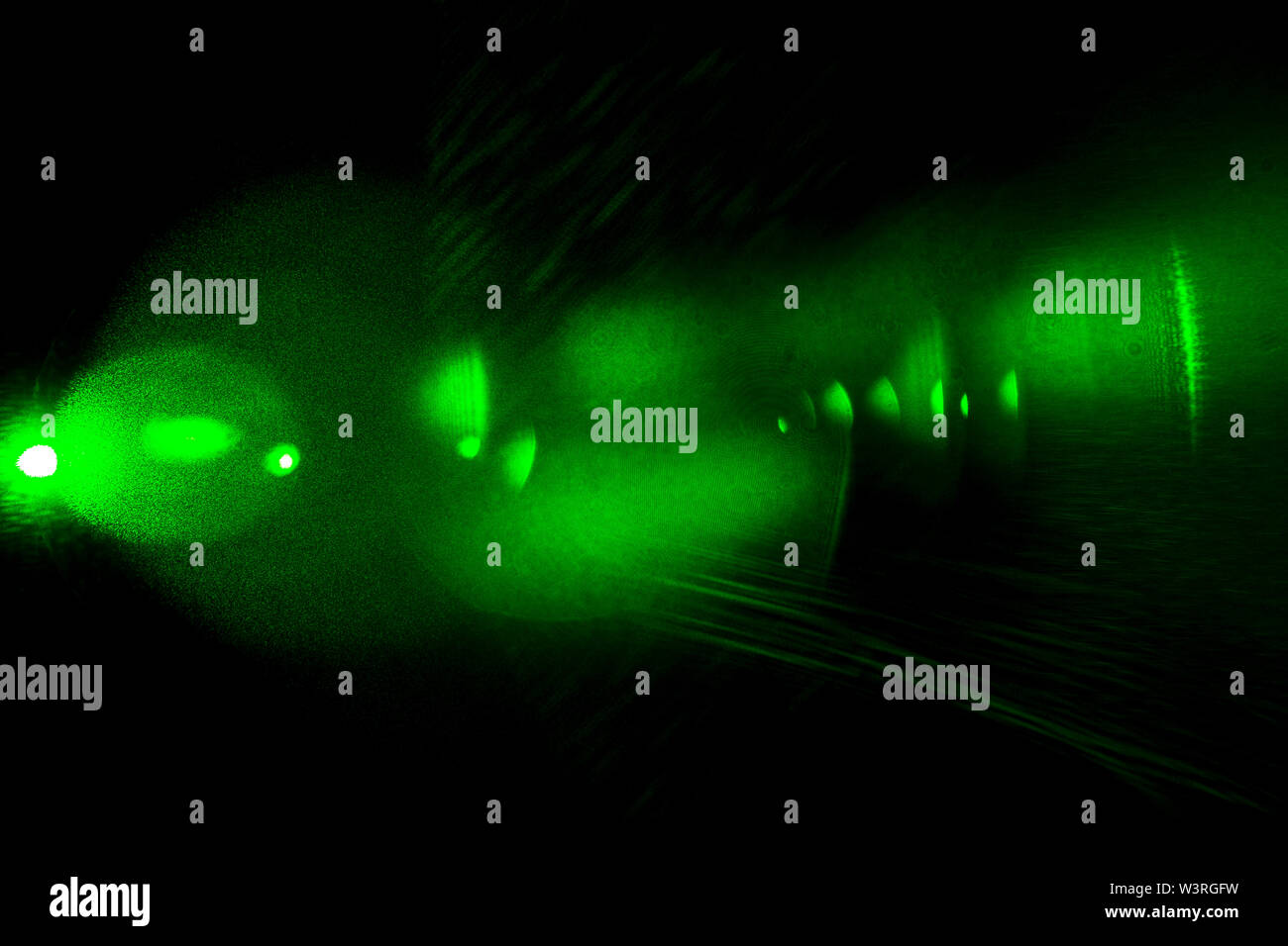 Camera lens flare by laser light create circles of objective iris ...