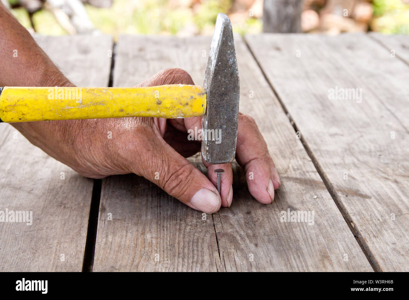 Hand hammer drive nail High Resolution Stock Photography and Images - Alamy