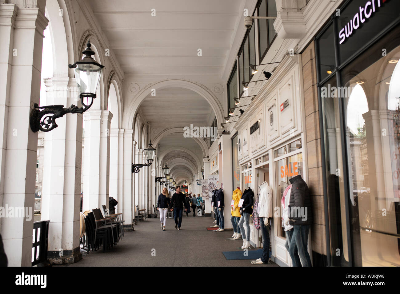 Shops in the Alsterarkaden, a historic shopping arcade by the Alster ...