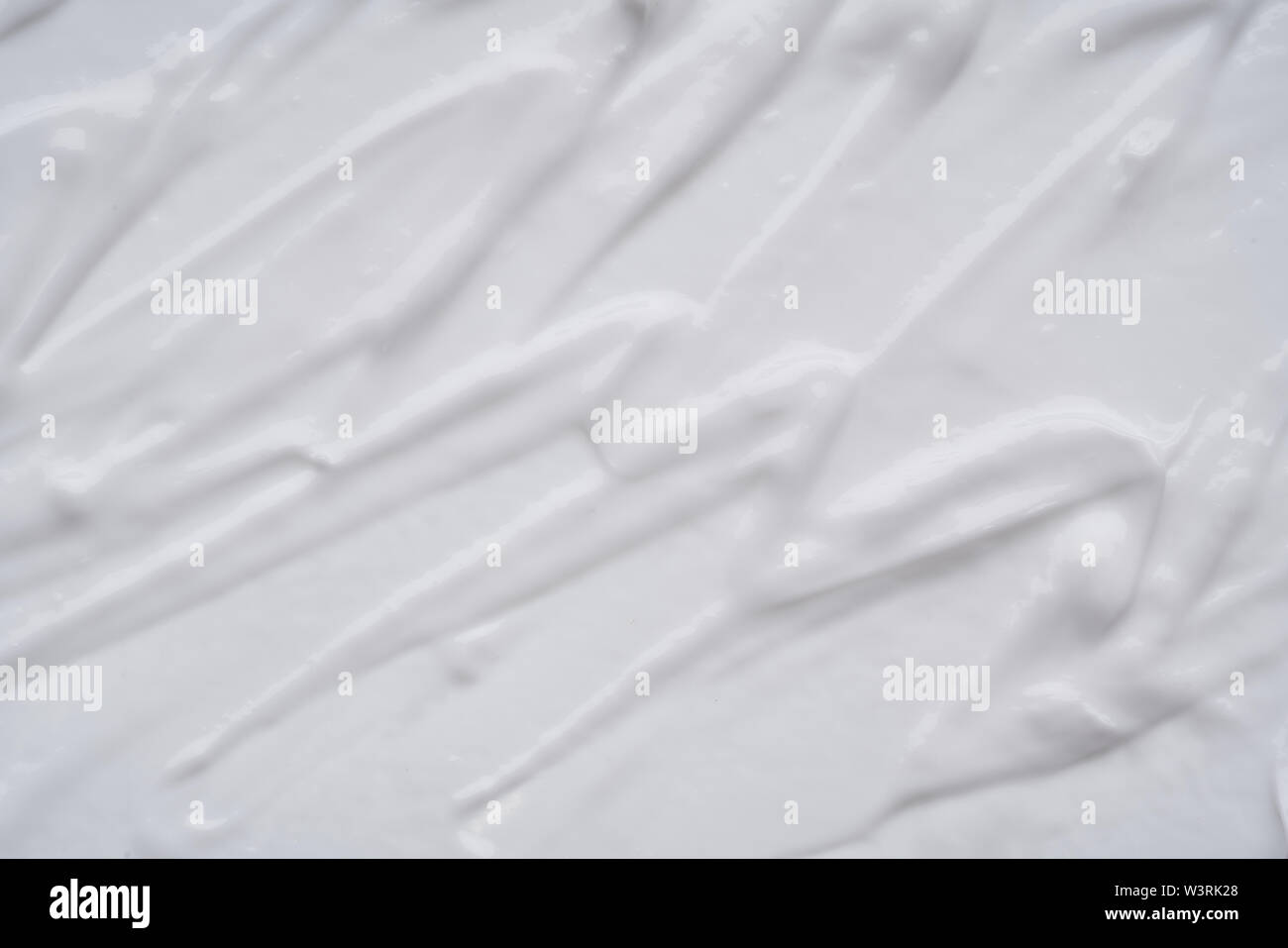 White smear and texture made with face clay or cream isolated on white ...