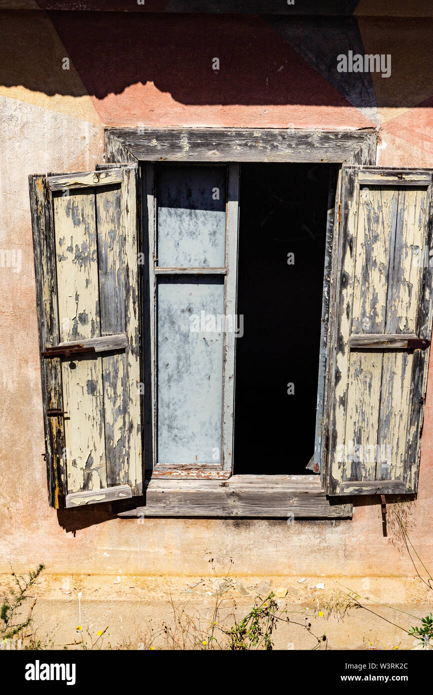 Exterior Window and Bleached Wooden Shutter Detail of a Derelict WW2 ...